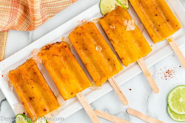 Mango Tajin Popsicles - Desserts on a Dime