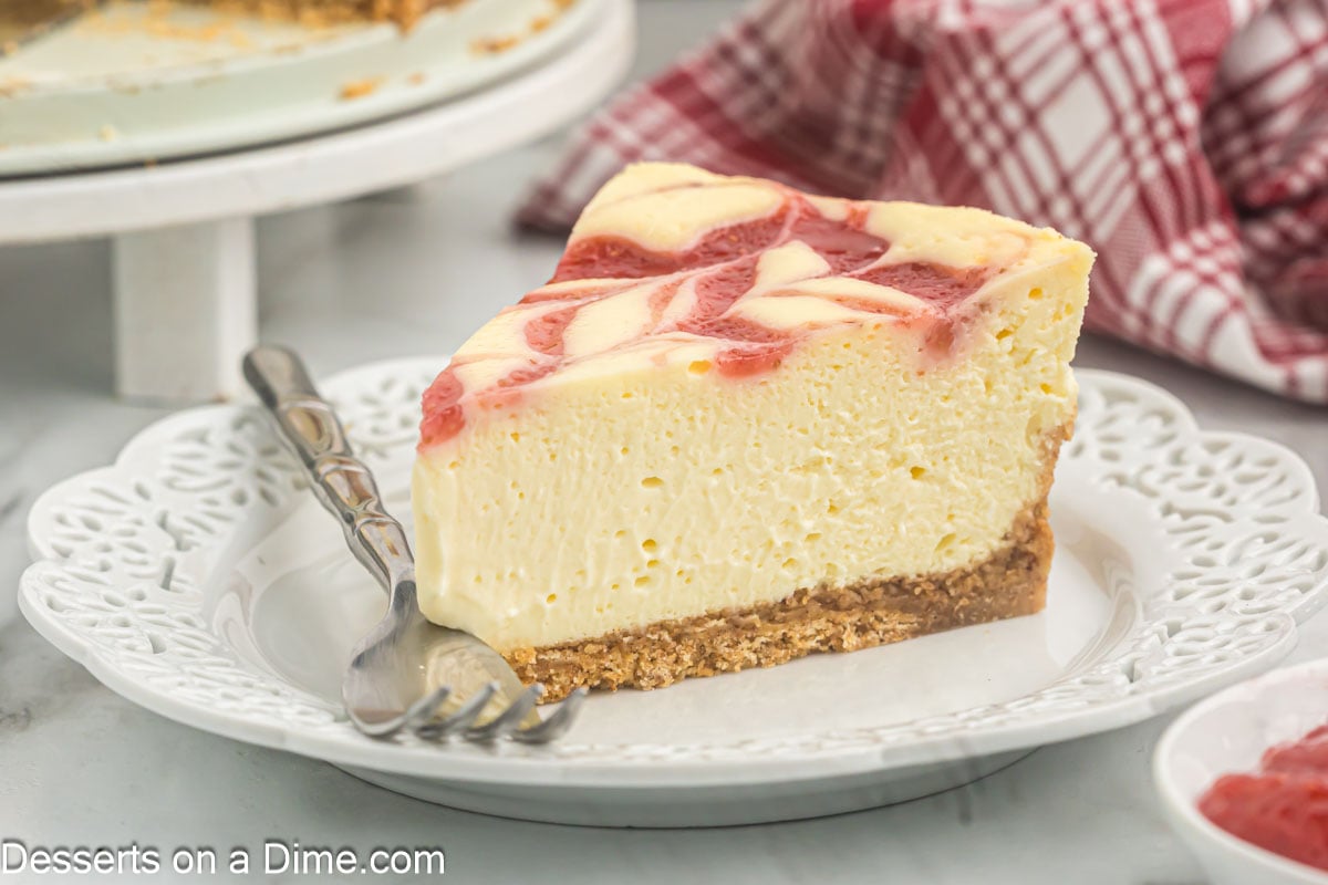 Strawberry Swirl Cheesecake - Desserts on a Dime