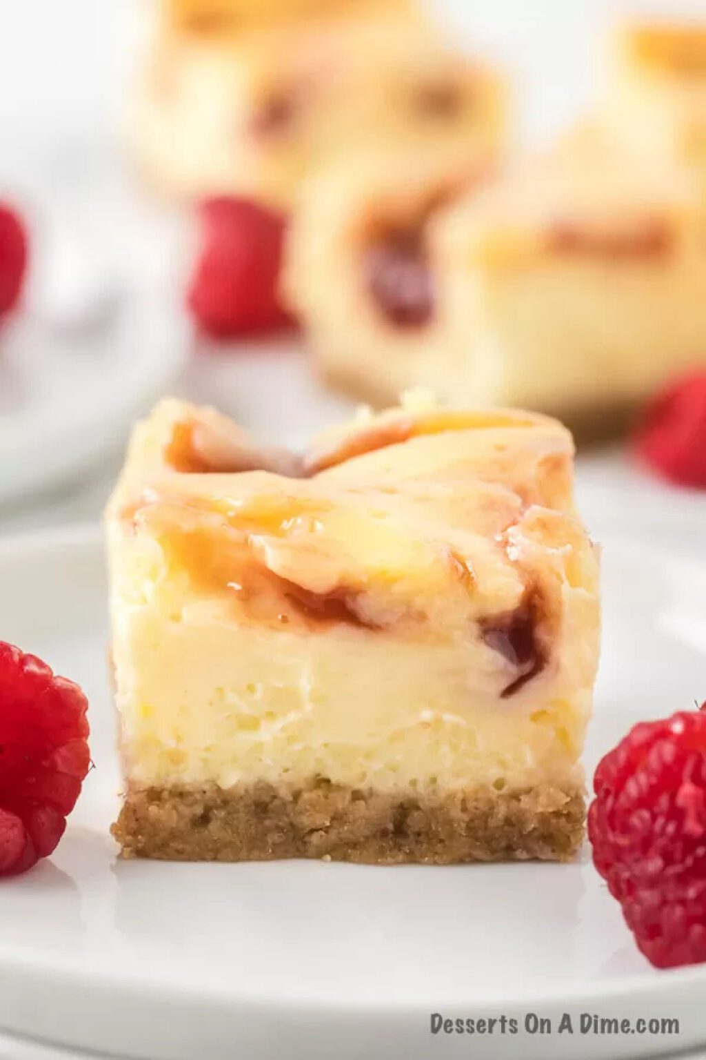 Raspberry Cheesecake Bars - Desserts on a Dime