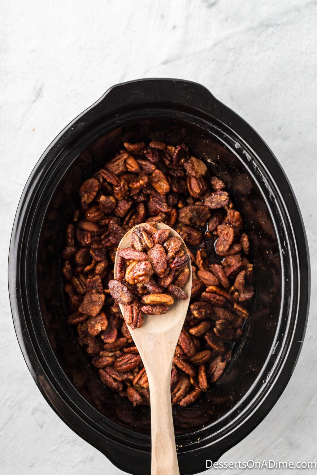 Slow Cooker Candied Pecans - Desserts on a Dime
